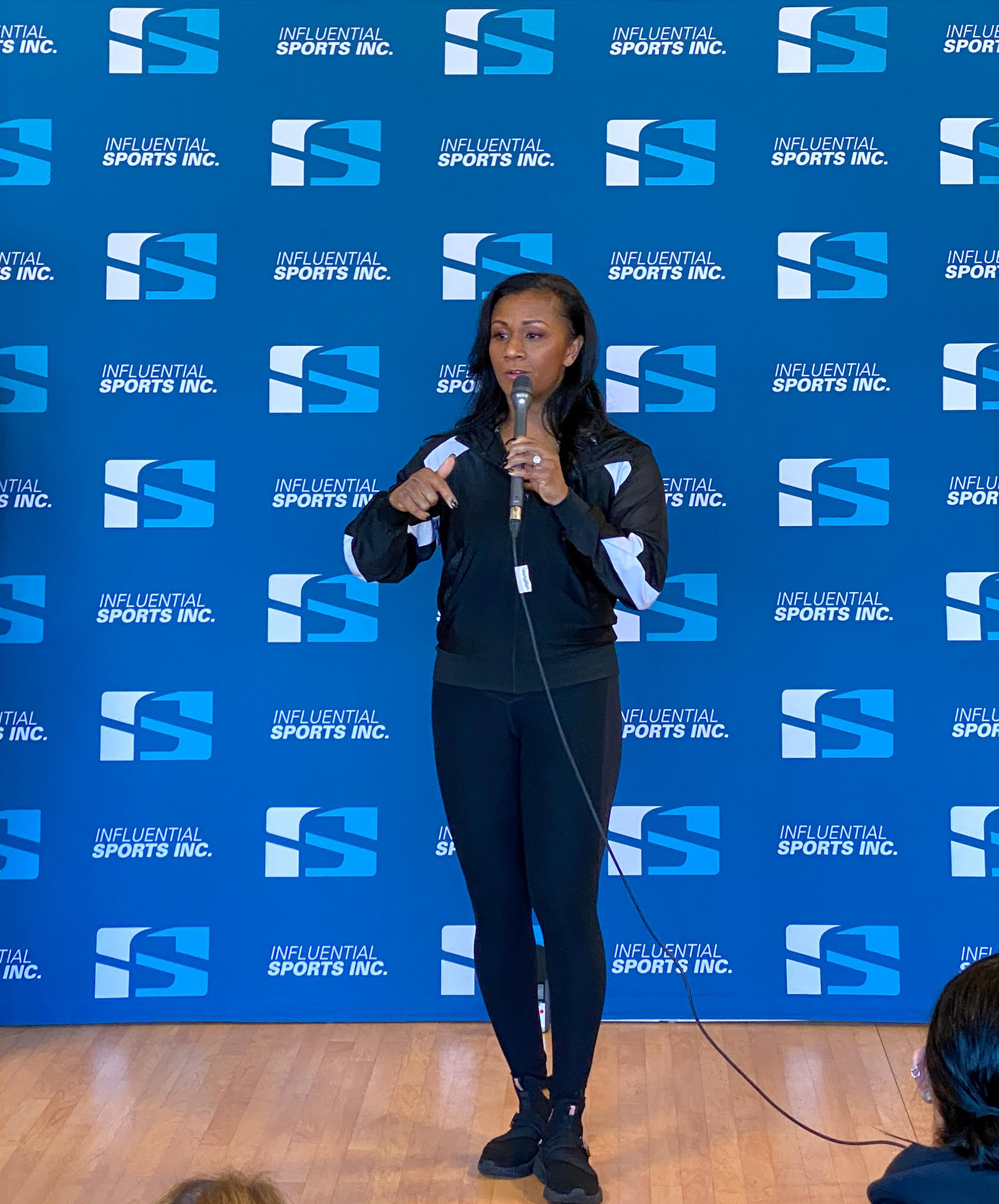 IFBB Pro Tanji Johnson Posing Seminar Review - Influential Sports Inc.